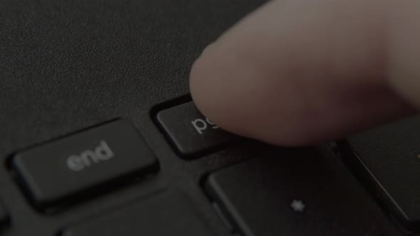 The Finger Presses the Page Up Button on the Keyboard, Stock Footage