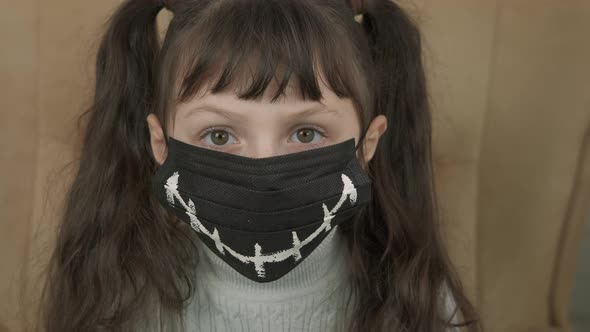 Child in scared mask., Stock Footage | VideoHive