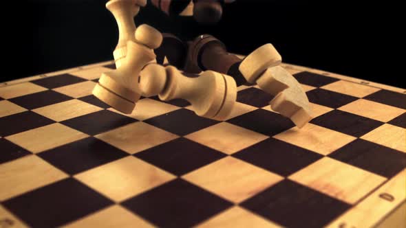 Super Slow Motion Chess Pieces Fall on the Chessboard, Stock Footage