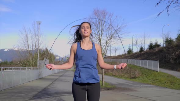 Young woman training outdoors skipping slow motion, Stock Footage ...