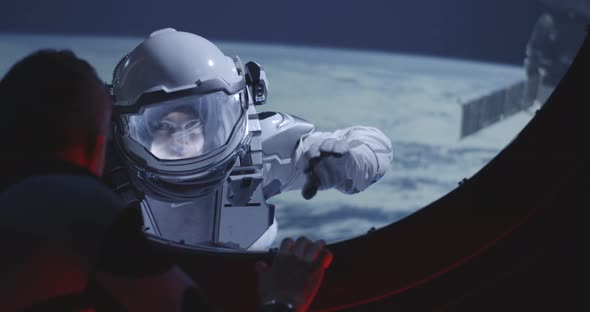 Astronaut Talking with Spacewalking Crewmate, Stock Footage | VideoHive