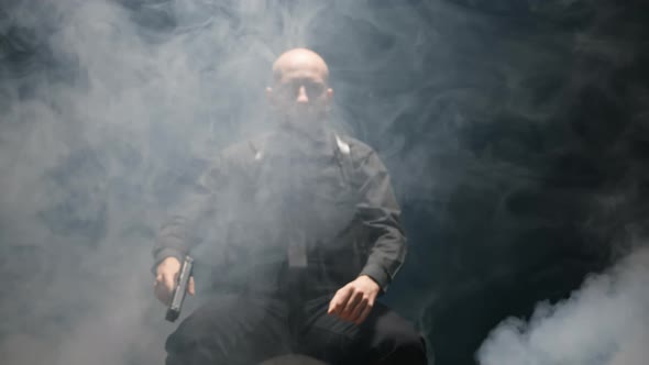 FBI Agent Holds Service Pistol Gun in His Hand and Leans Forward on ...