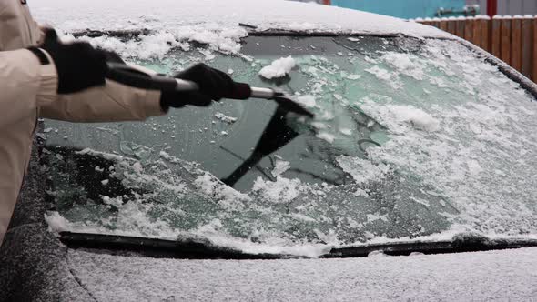 Man Scraping Ice Off Frozen Windshield Of A Car During Winter, Stock ...