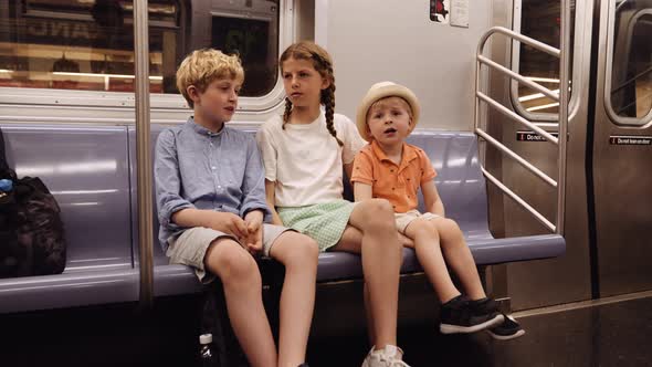 Three Kids Ride Subway, Stock Footage | VideoHive
