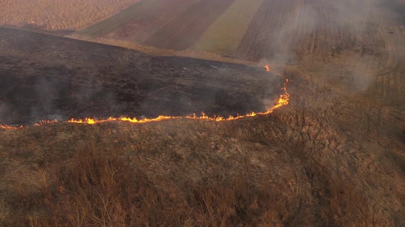 Aerial View of Spring Dry Grass Burning Field. Fire and Smoke in the ...