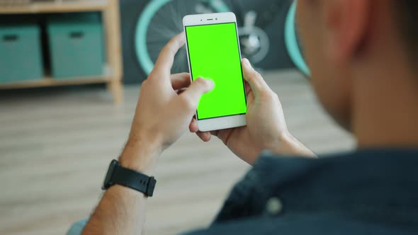 Male Hand Swiping Smartphone with Green Screen Touching Browsing ...