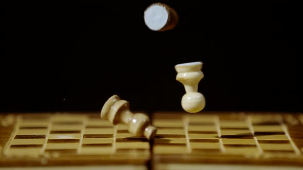 Close up of chess pieces falling on chess board, Ultra Slow Motion ...