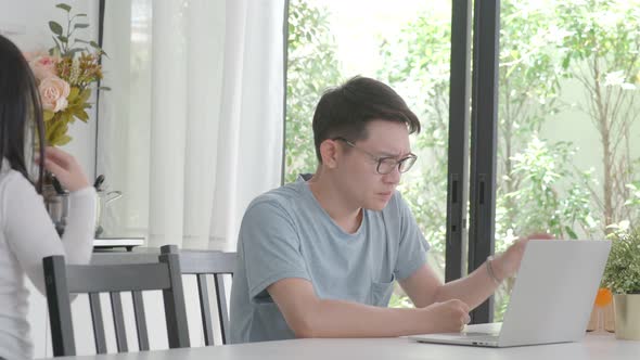 The daughter is encouraging the hardworking father., Stock Footage