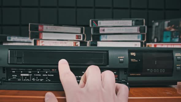 Insert VHS Cassette Into VCR and Push Play Button, Stock Footage ...