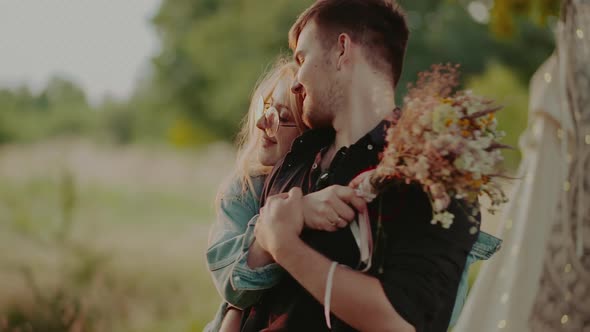 Engaged Attractive Couple Hug Against Camp, Stock Footage | VideoHive