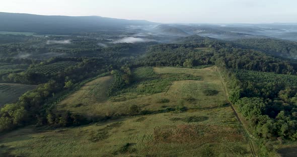 Aerial view panning to the left of the West Virginia countryside with ...