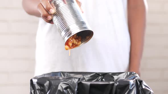 Throwing Tin Container in a Garbage Bin, Stock Footage | VideoHive
