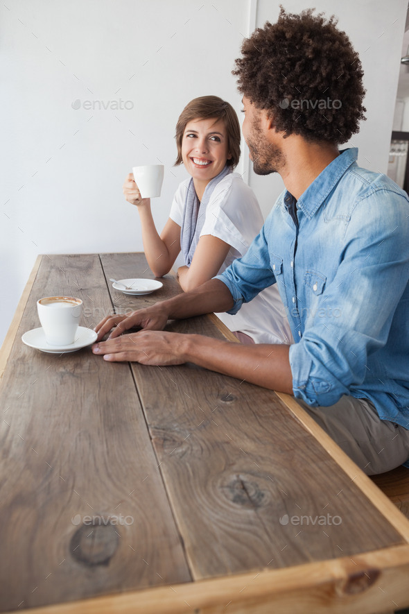 Casual friends having coffee together at the coffee shop Stock Photo by ...