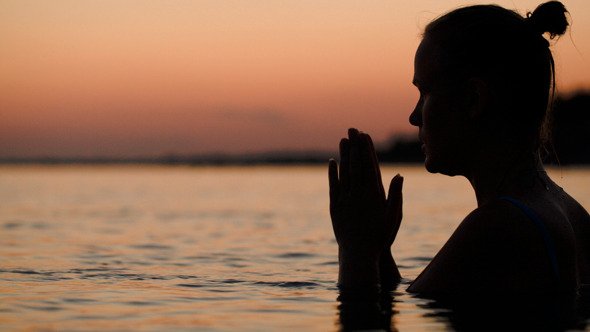 Woman In Water Praying Or Meditating, Stock Footage | VideoHive