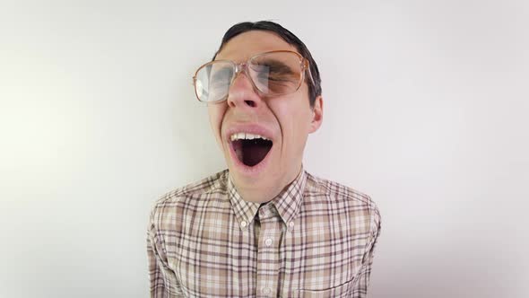 Portrait Tired Yawning Nerd in Glasses, Stock Footage | VideoHive