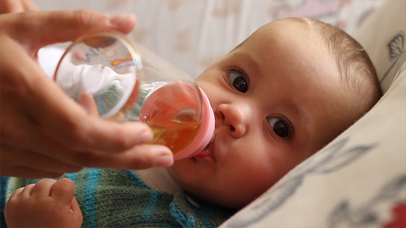 Baby Drinking Tea, Stock Footage | VideoHive