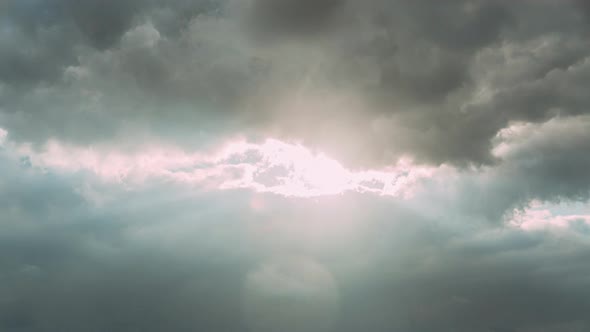 Sunrays Sunray Shine Through Dark Clouds In Cloudy Blue Sky, Stock Footage