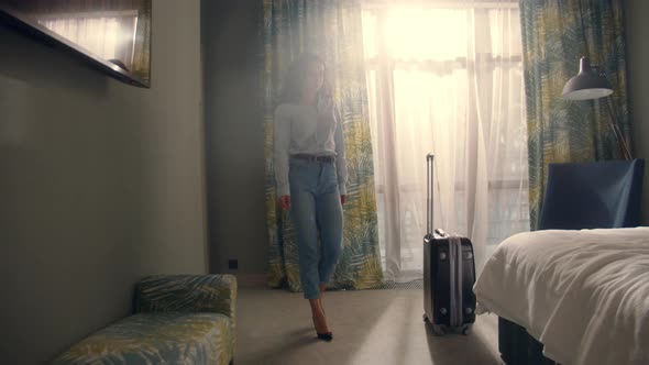 Sweet Lady Coming in Hotel Room. High Heels Woman Resting in Luxury ...