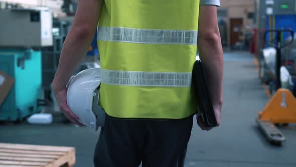 Factory Worker Walking Through Industrial Facilities, Stock Footage