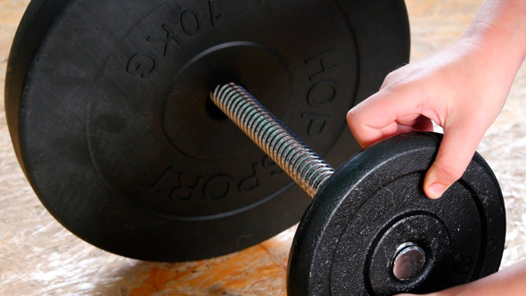 Adding Weights To A Dumbbell, Stock Footage | VideoHive