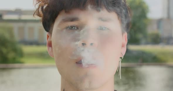 Cute Portrait of Vaping Guy in the Field at Sunset, Stock Footage ...