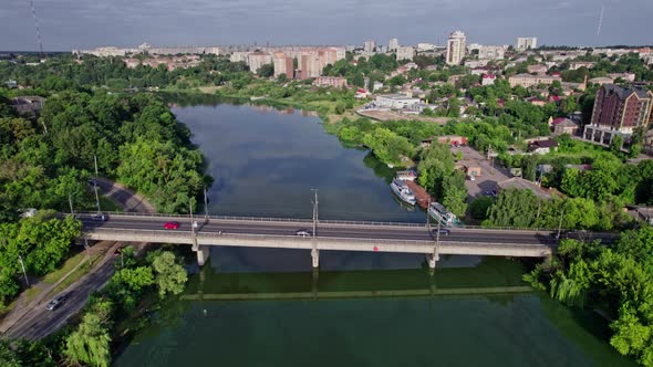 Panoramic View of Small City Near River with Bridge, Stock Footage