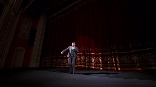 Motivational Speaker. Male actor on classic theatre stage., Stock Footage