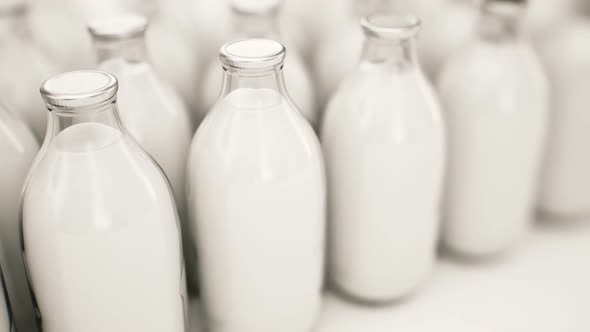 Endless animation of bottles with natural milk infinite array. Loopable ...