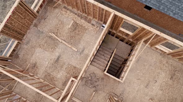 Overhead aerial of a framed two story house still in need of utilities ...