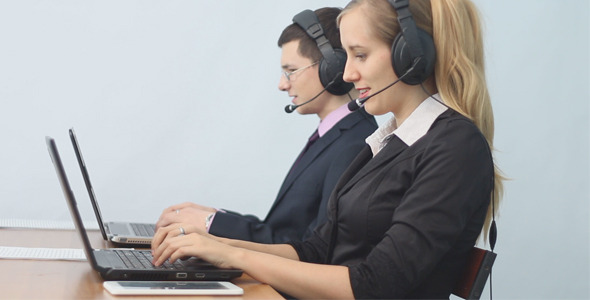 Two Call Center Operators Talking With Clients, Stock Footage | VideoHive