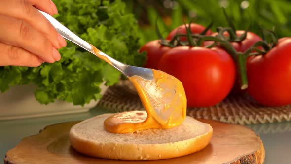 Spoon Smears the Sauce Onto a Hamburger Bun, Stock Footage | VideoHive