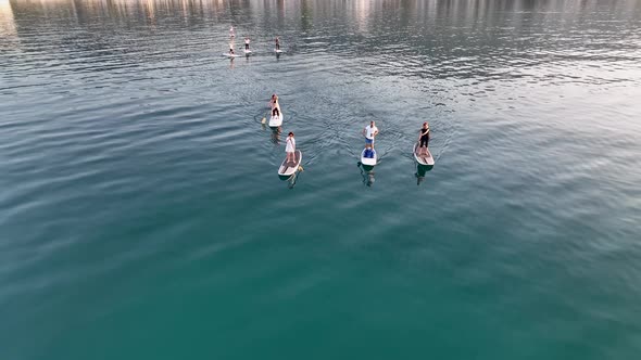 Sup surfing group aerial view 4 K Turkey Alanya, Stock Footage | VideoHive