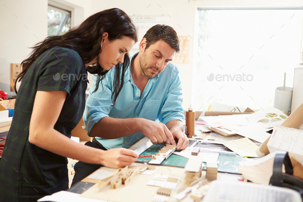 Two Architects Making Models In Office Together Stock Photo by ...