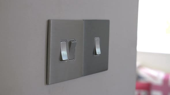 Man Turning On Electric Light Switch, Stock Footage | VideoHive