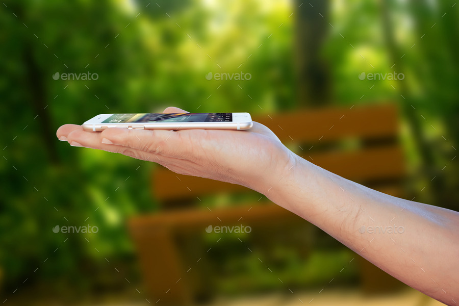 Smartphone in Hand Mockup , Graphics | GraphicRiver