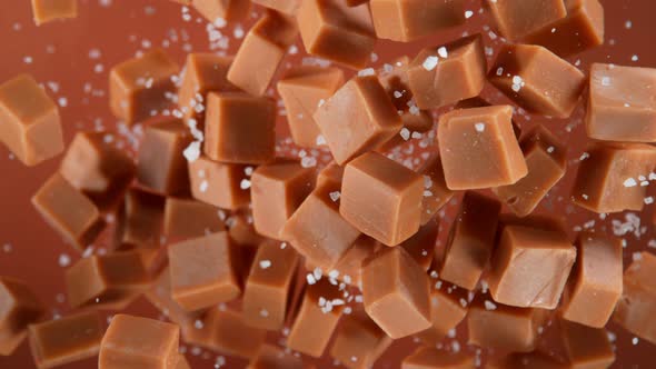 Super Slow Motion Shot of Salted Caramel Explosion Towards Camera at ...