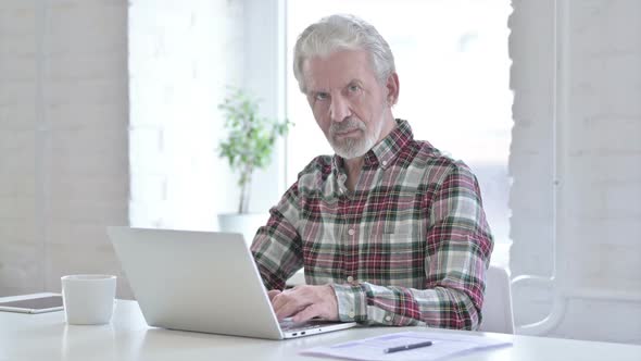Attractive Casual Old Man Saying No By Finger in Office, Stock Footage