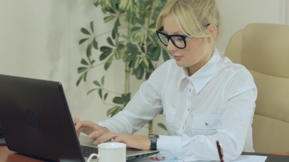 Beautiful Girl Typing On a Keyboard In Office, Stock Footage | VideoHive