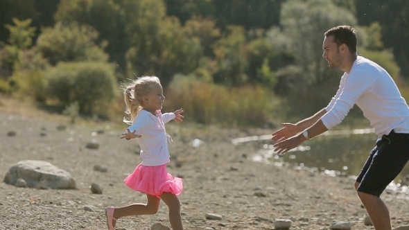Little Blond Girl Running Toward Father And He, Stock Footage | VideoHive