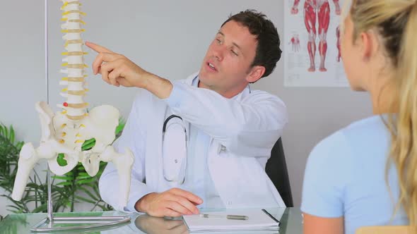 Chiropractor Talking With His Patient, Stock Footage | VideoHive