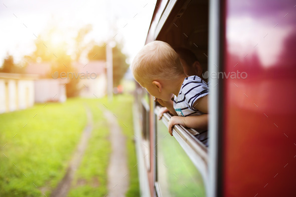 Little boy travelling in train Stock Photo by halfpoint | PhotoDune