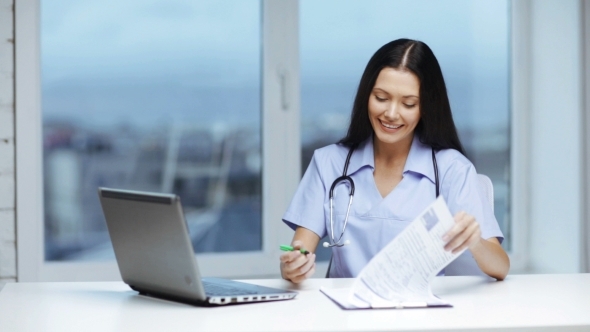 Happy Doctor Or Nurse Signing Medical Documents, Stock Footage | VideoHive