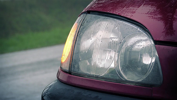 Car Light Flashing As Cars Pass In The Rain, Stock Footage | VideoHive