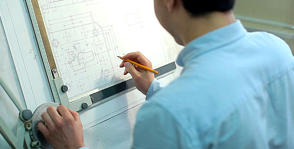 Man Draws a Technical Drawing on Drawing Board, Stock Footage | VideoHive