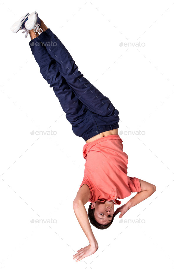 Break dancer doing one handed handstand against a white background ...