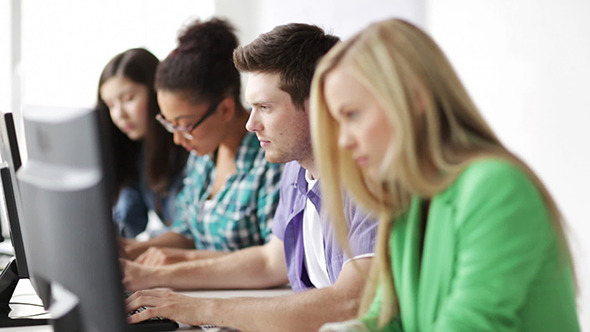 Students Making Computer Test At Informatics by dolgachov | VideoHive