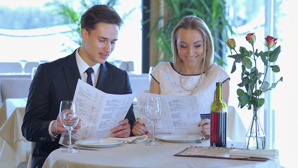 Couple Chooses The Menu, Stock Footage | VideoHive