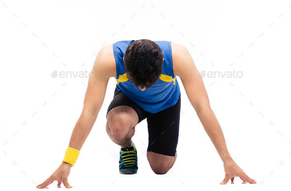 Man getting ready to run Stock Photo by vadymvdrobot | PhotoDune