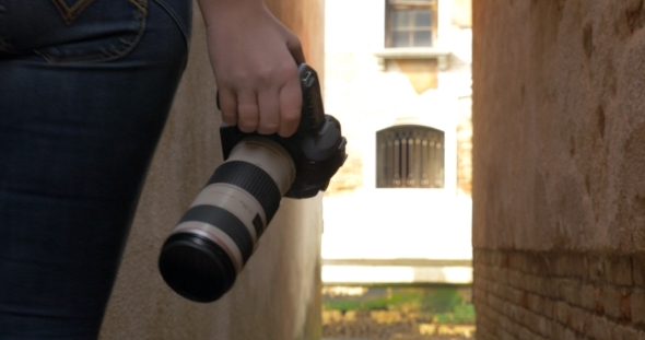 Woman With Photo Camera Wandering In Alleyway, Stock Footage | VideoHive