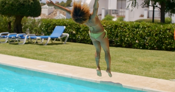 Sexy Girl In Bikini Doing Back Flip Into Pool, Stock Footage | VideoHive